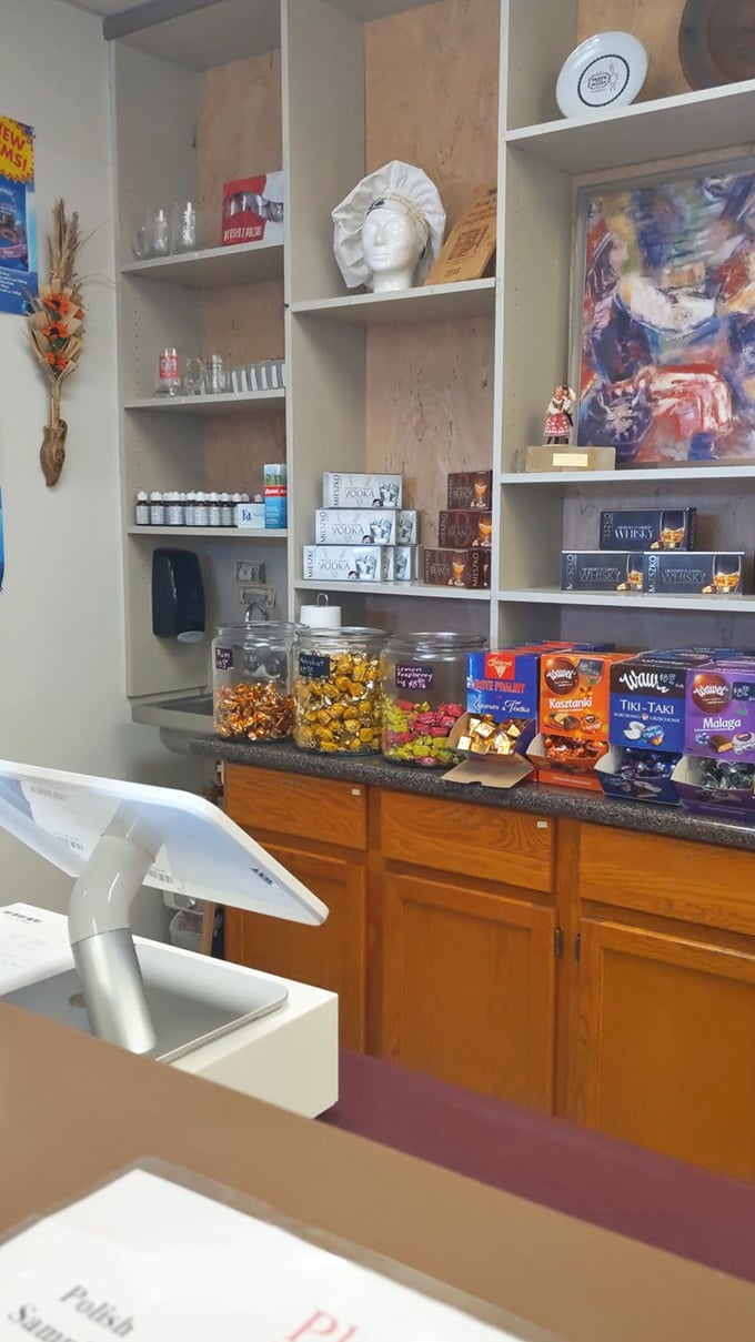 Behind every great Polish deli is a counter of treasures and colorful candy jars. The chef's hat mannequin stands guard over the sweets.