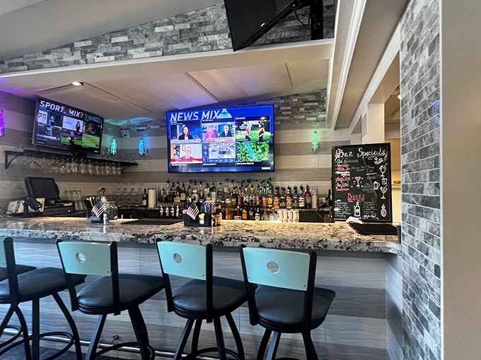 The well-stocked bar promises liquid refreshment for parched seafood enthusiasts. After wrestling with crab legs, you've earned that cocktail.