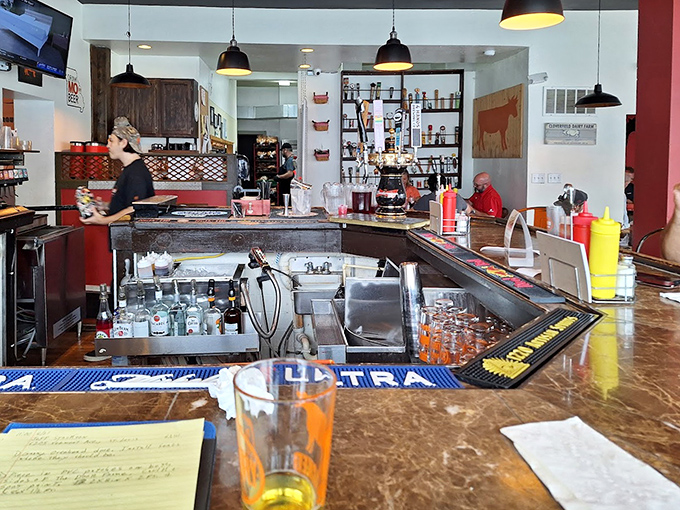 Behind the counter is where the magic happens &ndash; a glimpse into the organized chaos that produces burger perfection.