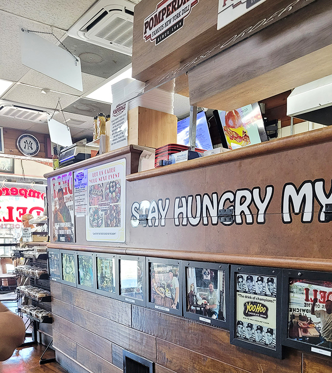 The counter where dreams are assembled and handed over in wax paper, one magnificent sandwich at a time.