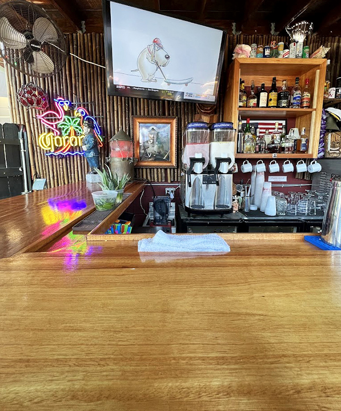 The bar area isn't just serving drinks&mdash;it's dispensing liquid happiness to complement the smoky treasures on your plate.