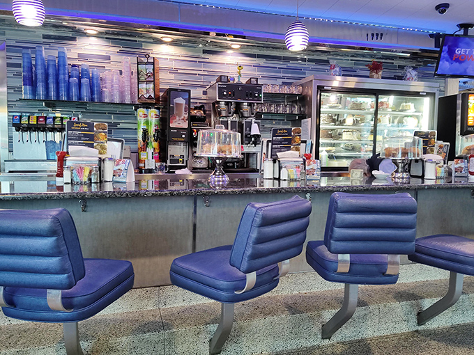 Classic counter seating where solo diners become regulars. Those blue swivel chairs have supported generations of hungry Pennsylvanians.