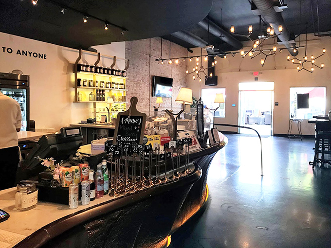 The bar area strikes that perfect balance between "I'm a serious cocktail establishment" and "Yes, we're definitely having fun here."