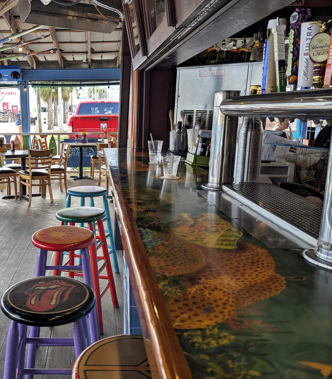The bar's colorful stools and marine-themed countertop invite you to pull up a seat and trade fishing stories with locals.
