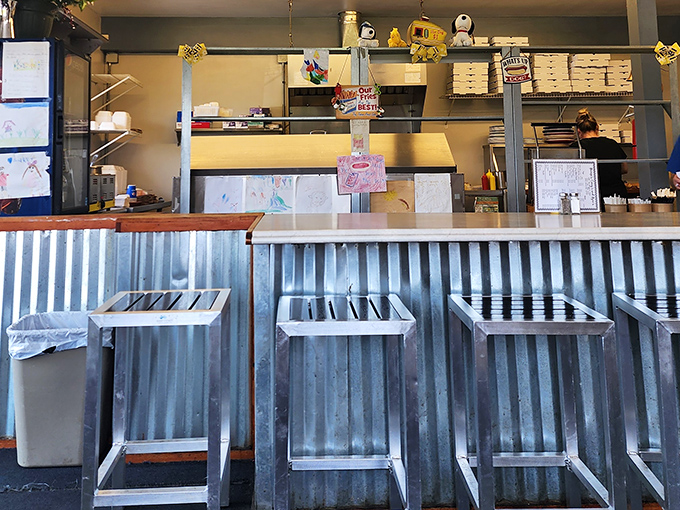 Another angle of the chef statue&mdash;he's seen thousands of satisfied customers come and go, and knows you're about to join their ranks.