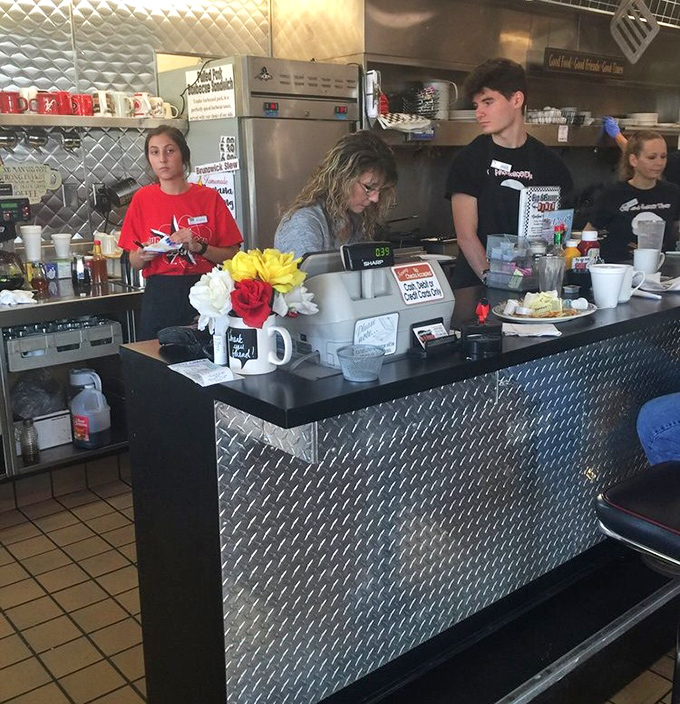 Where the magic happens. The counter staff orchestrates breakfast symphonies with the precision of NASA engineers and twice the personality.