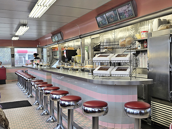 The counter with its row of red stools invites solo diners to perch and watch the short-order ballet unfold &ndash; breakfast choreography at its finest.