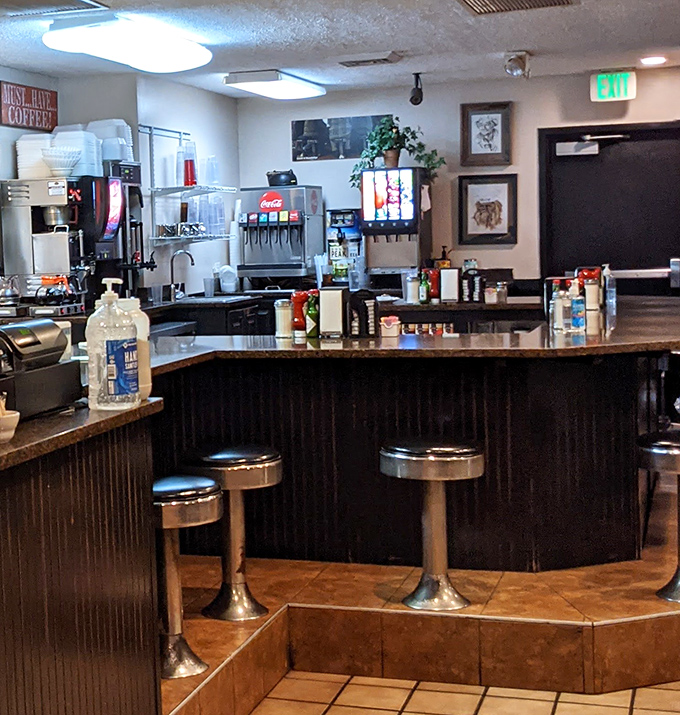 Counter seating: where solo diners become temporary family and servers know exactly when you need that second coffee.
