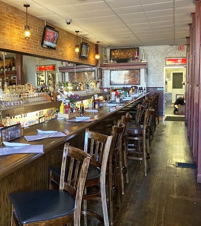 The long, inviting bar is where strangers become friends and friends become family&mdash;all bonded by exceptional food and drink.