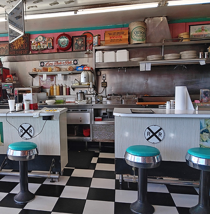 The open kitchen design lets you watch breakfast magic happen in real time&mdash;those railroad crossing symbols remind you you're at the intersection of hungry and happy.