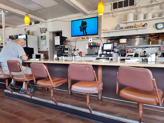 The counter&mdash;where solo diners find community, coffee cups never reach empty, and the world's problems get solved one hash brown at a time.