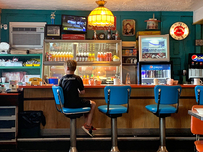 Behind the counter, the heart of Fred's beats with vintage charm&mdash;stained glass pendant lights and blue swivel seats that have witnessed countless Ohio mornings.