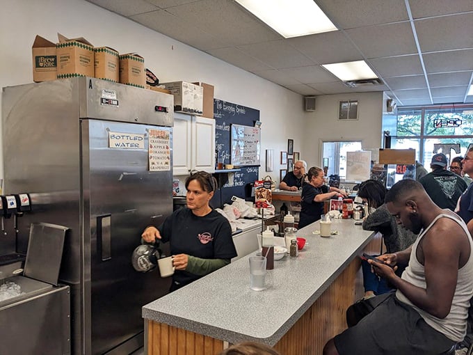 The counter &ndash; where solo diners become regulars and the coffee refills flow like conversation. Diner democracy in action.