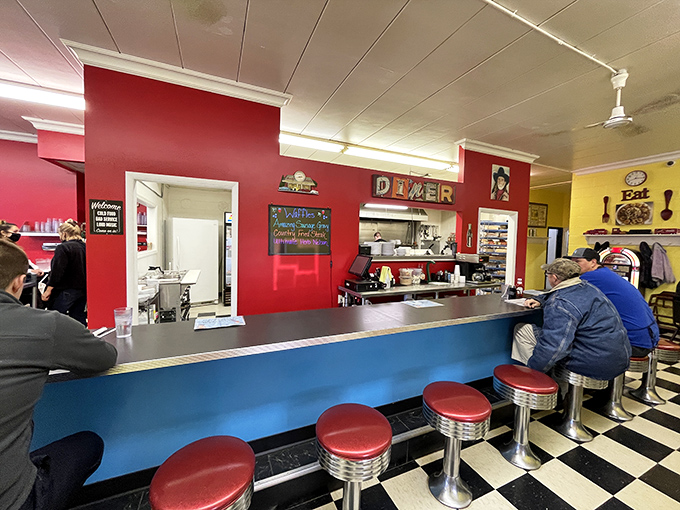 The counter seats offer front-row views to the breakfast show, where regulars exchange stories while watching their meals come to life.