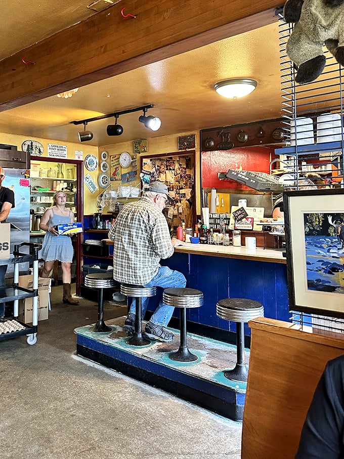 Counter seating: where solo diners become temporary locals, watching the kitchen ballet while eavesdropping on conversations that could only happen in small-town America.