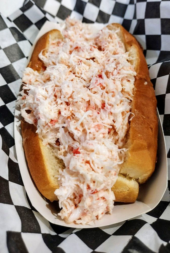 The crab roll's less famous but equally delicious cousin to the lobster roll—sweet, delicate crab meat piled high on a toasted bun that's ready for its close-up.