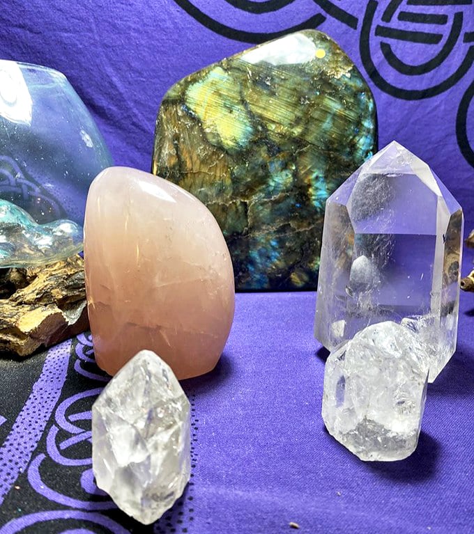 Earth's treasures glow with inner light against purple velvet. These crystals didn't come from a gift shop&mdash;they came from the planet!