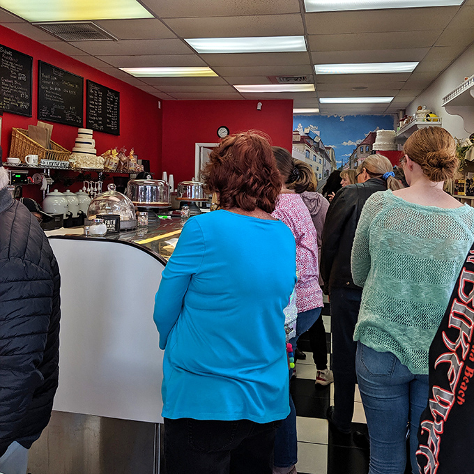 The universal language of anticipation&mdash;a line of customers who know that good things come to those who wait.