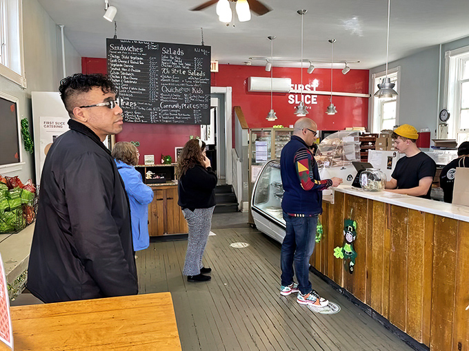 The line forms for good reason. Locals know that patience at First Slice is always rewarded with something worth writing home about.