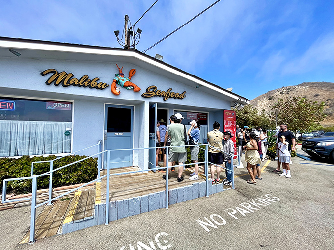 The line forms early at this PCH landmark. Like waiting for a Hollywood premiere, except the stars are the fish and the red carpet is concrete.