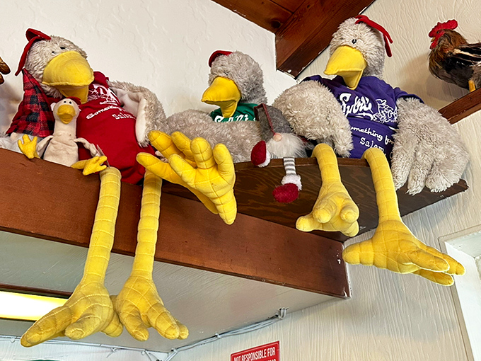 The chicken-themed decor adds whimsical charm to Sybil's, with stuffed roosters keeping watch over hungry diners below.