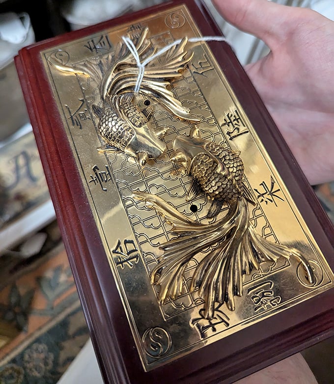 Not just decorative&mdash;it's practically wearable architecture. This golden fish plaque transforms ordinary walls into conversation-starting showcases.