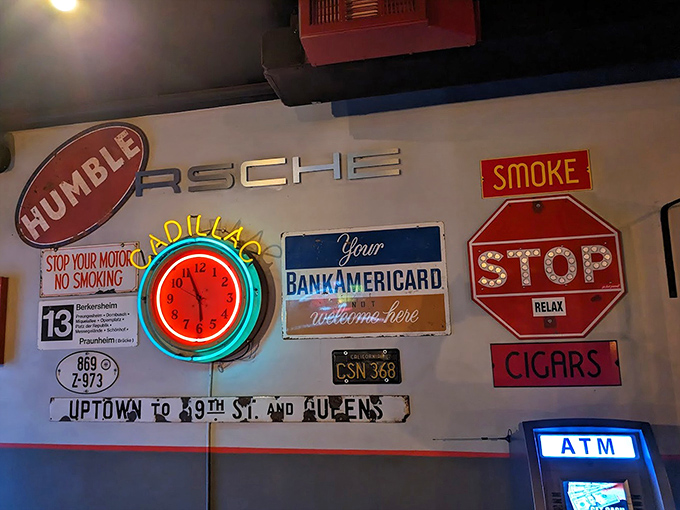 The wall decor tells stories of automotive adventures past. That neon clock reminds you it's always time for good food and cold drinks.