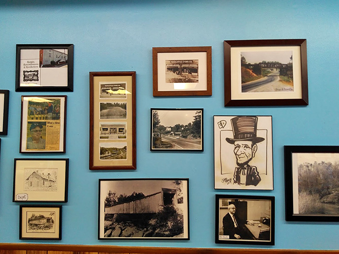 The blue walls serve as Franklinville's unofficial museum, where every frame tells a story and every picture preserves a memory.