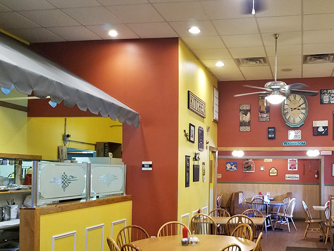 Red walls adorned with local memorabilia tell stories that menus can't. Every picture frame holds a chapter of Waynesville history.