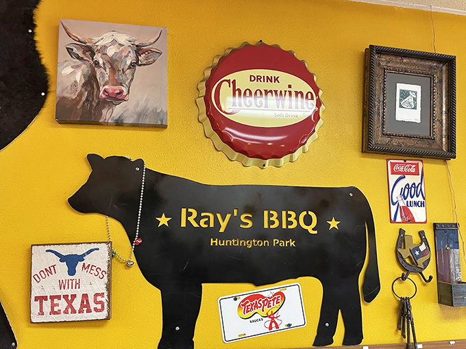 The wall art says it all: "Don't Mess With Texas" meets "Ray's BBQ" in a celebration of bovine beauty and barbecue heritage.