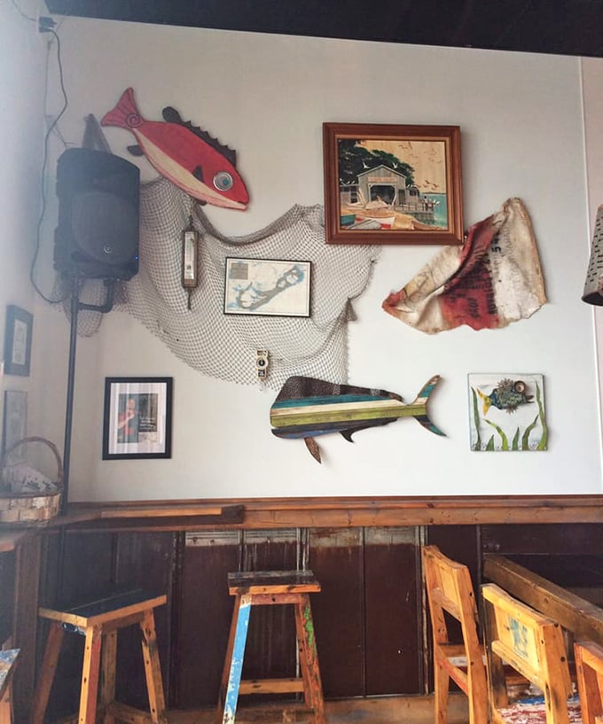 The wall d&eacute;cor strikes that perfect balance between "authentic fishing village" and "we actually know what we're doing with seafood."