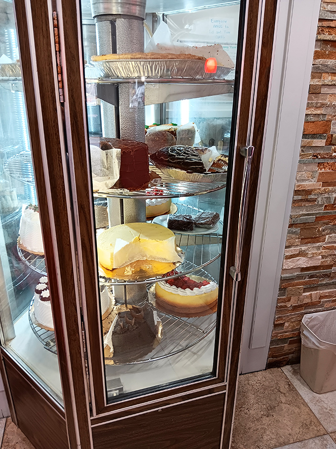 The dessert case—nature's cruelest practical joke on those who arrived "just planning to have a salad." Resistance is futile.