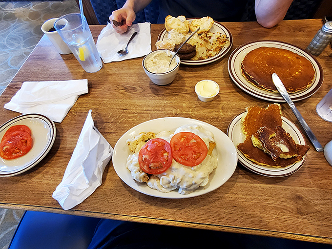 A table spread that tells the story of American comfort food&mdash;pancakes, biscuits and gravy, and enough coffee to jumpstart your heart.