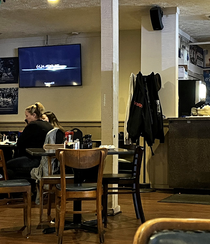 Where conversations flow as easily as the sweet tea. These wooden chairs have supported countless family gatherings and first dates over the years.