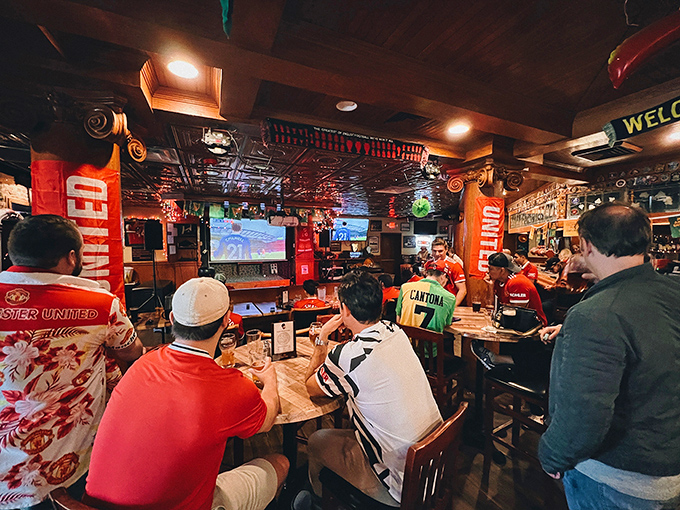 Game day transforms the pub into a sea of Manchester United red, where strangers become instant friends united by their passion for football.