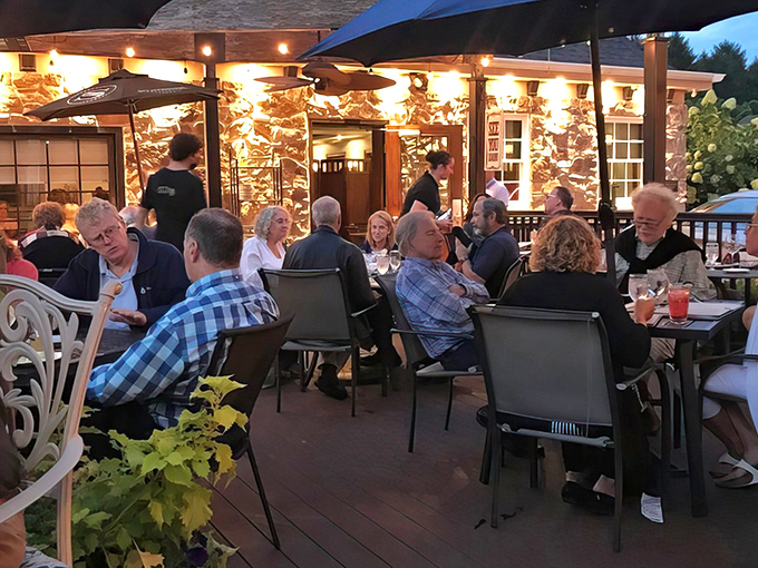 The outdoor patio at dusk&mdash;where summer evenings stretch into memory-making moments and strangers at nearby tables become temporary friends.