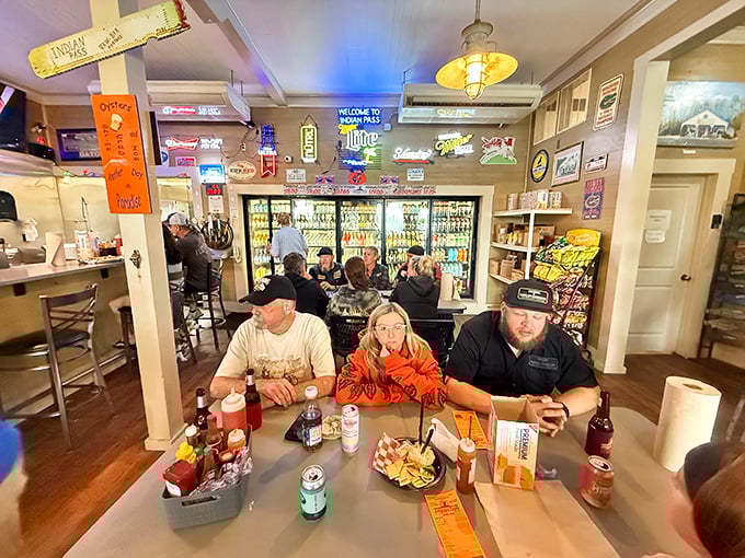 The true measure of a great local spot: tables filled with people who look like they've been coming here since before you knew what an oyster was.