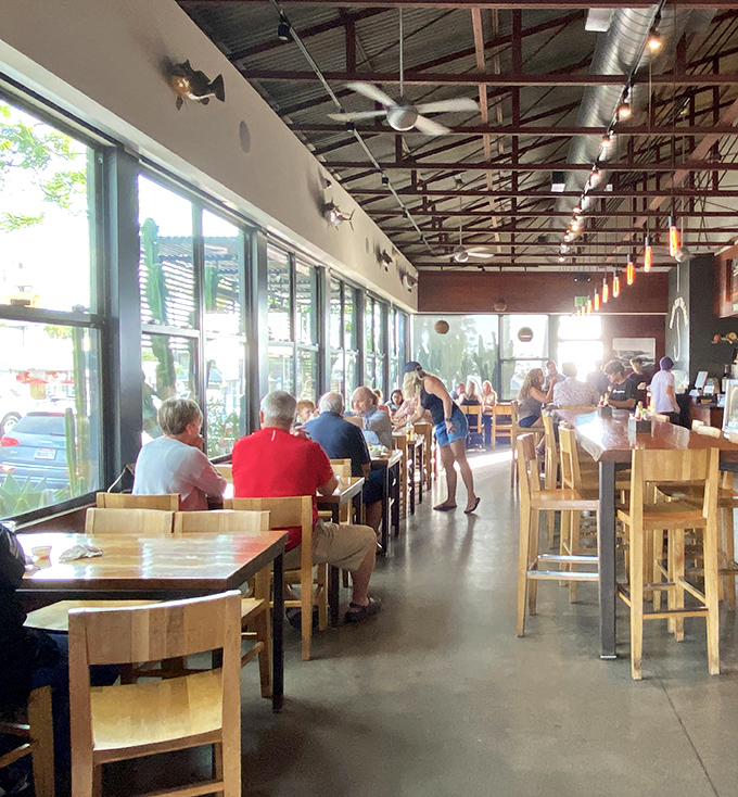 Sunlight streams through windows illuminating happy diners who've discovered what locals have known for years: this is seafood worth celebrating.