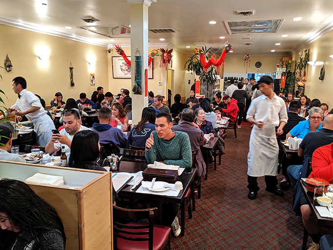 The packed dining room speaks volumes – these aren't just customers, they're witnesses to greatness.
