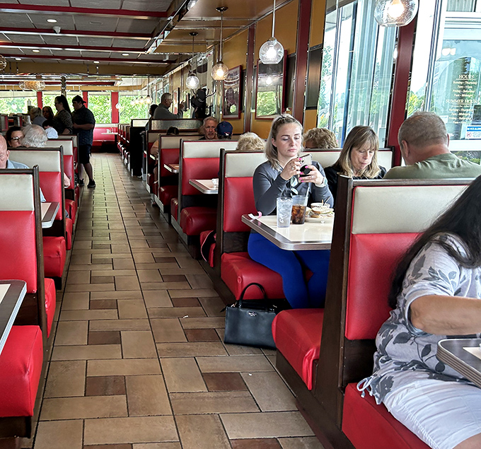 Full booths mean full hearts at Ambrosia, where strangers at adjacent tables often become friends by the time the check arrives.