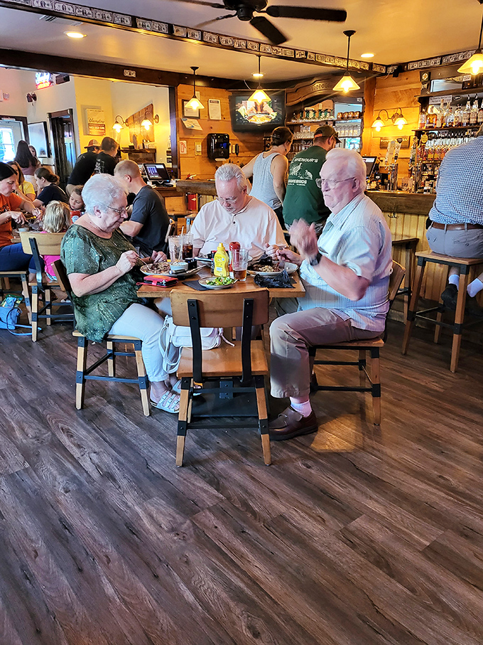 The dining room buzzes with the universal language of good food &ndash; satisfied smiles and animated conversations.