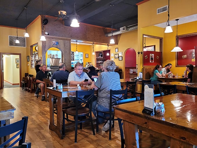 Tables filled with diners experiencing that moment of collective joy that only comes from sharing great food in a welcoming space.