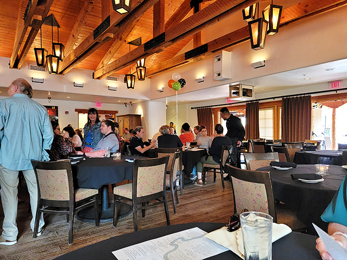 A dining room humming with the symphony of satisfaction. Under those wooden beams, strangers become united by the universal language of "mmm."