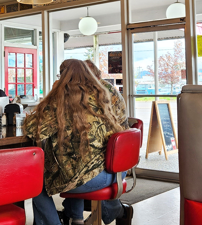 Every red booth tells a story at Fins, where locals and travelers alike find common ground in the universal language of good food.