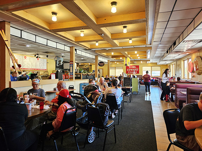 A bustling morning scene where regulars and newcomers share space and stories. Some relationships here are older than many marriages.