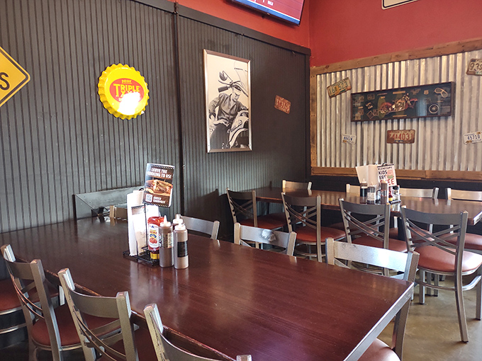 Simple wooden tables that have witnessed countless BBQ epiphanies. The corrugated metal walls tell stories of meals past.