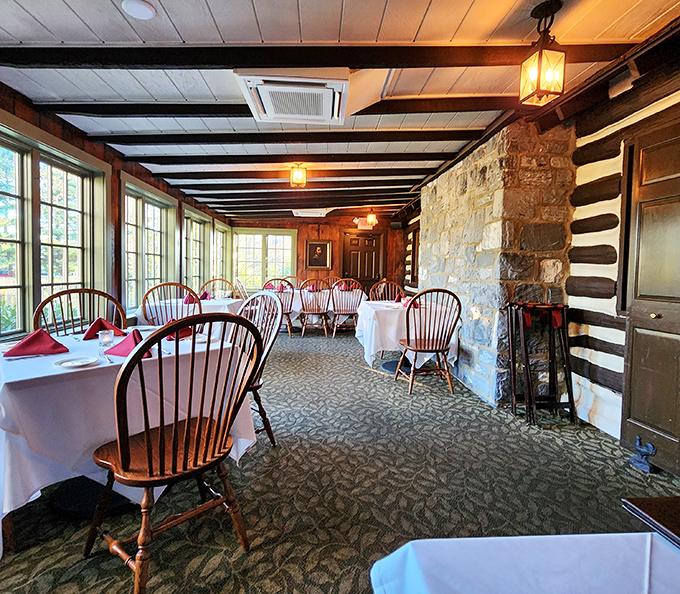 Windsor chairs and white tablecloths against log walls create that rare dining room where Paul Bunyan and Martha Stewart would both feel perfectly at home.
