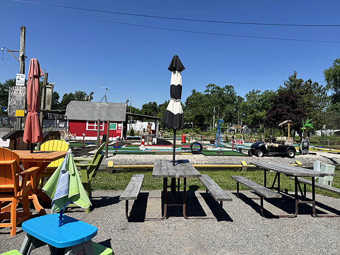 Picnic tables, colorful chairs, and open sky—the original dining room design before restaurants decided we needed mood lighting and uncomfortable stools.