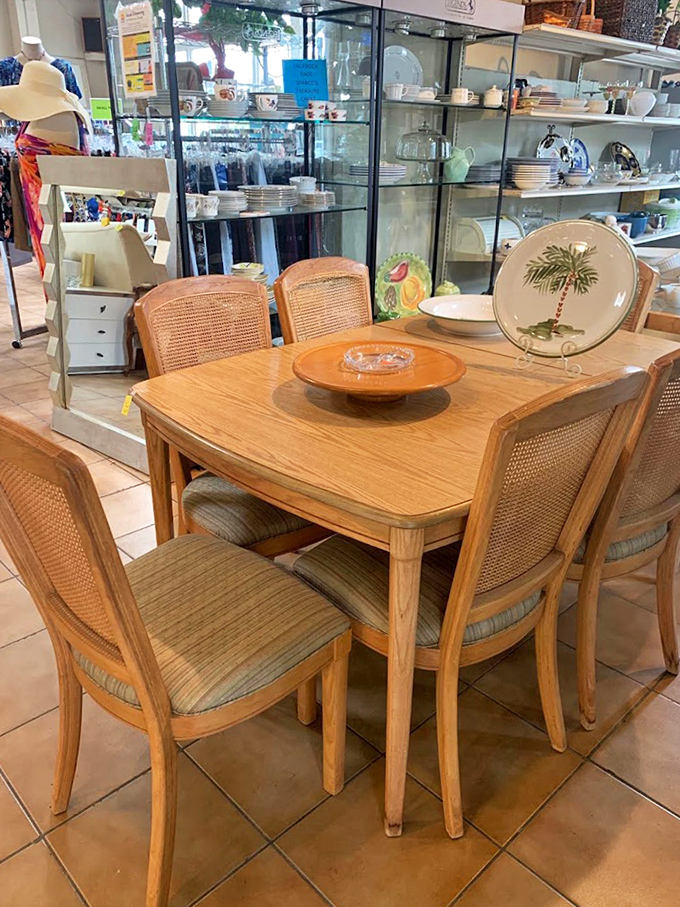 This dining set isn't just furniture&mdash;it's an invitation to gather. That palm tree plate is practically begging to serve key lime pie.