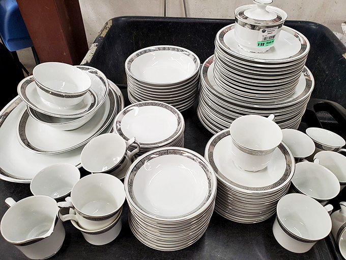 This pristine dinnerware set waits for its next dinner party. Someone's grandmother would be proud to see it used again.